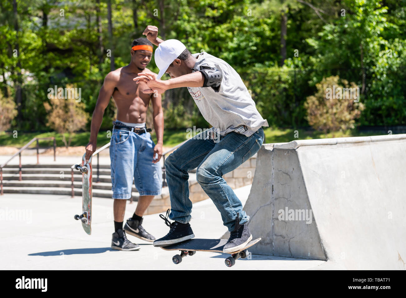 Male skateboarder in skatepark hi-res stock photography and images - Alamy