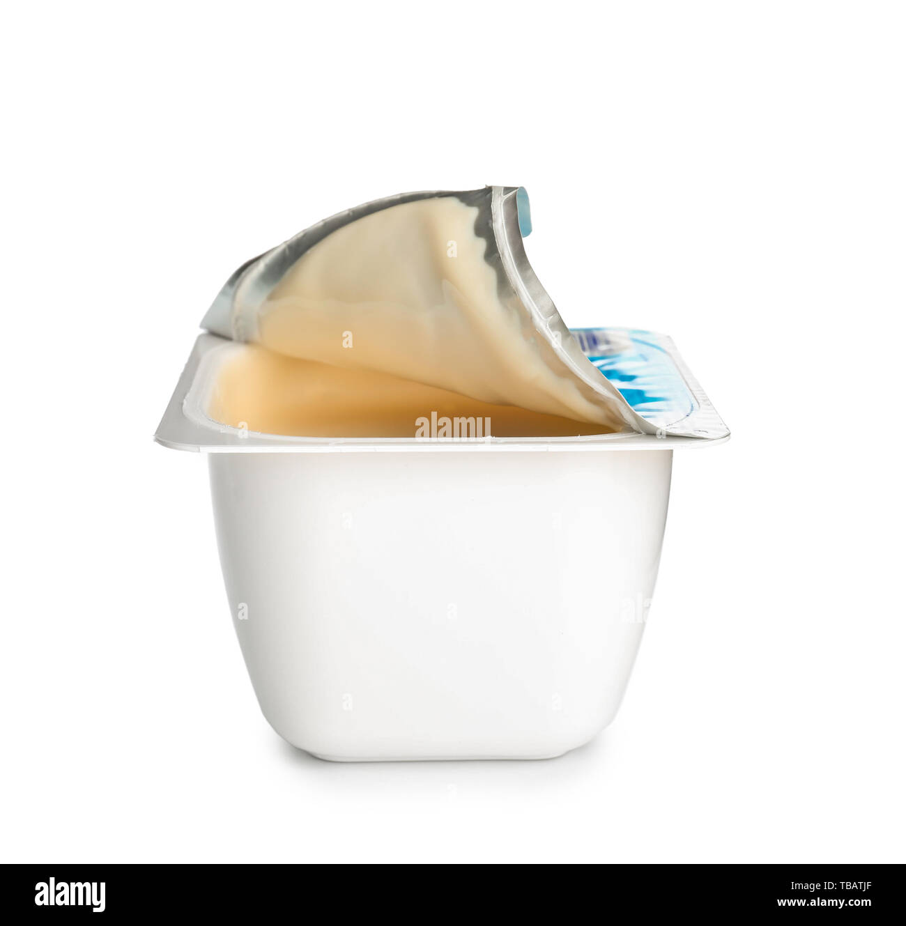 Container with tasty yogurt on white background Stock Photo - Alamy