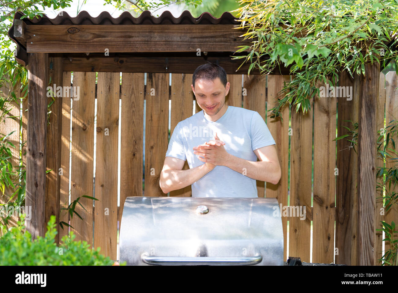 Barbeque bbq modern new grill in outdoor nature summer backyard garden ...