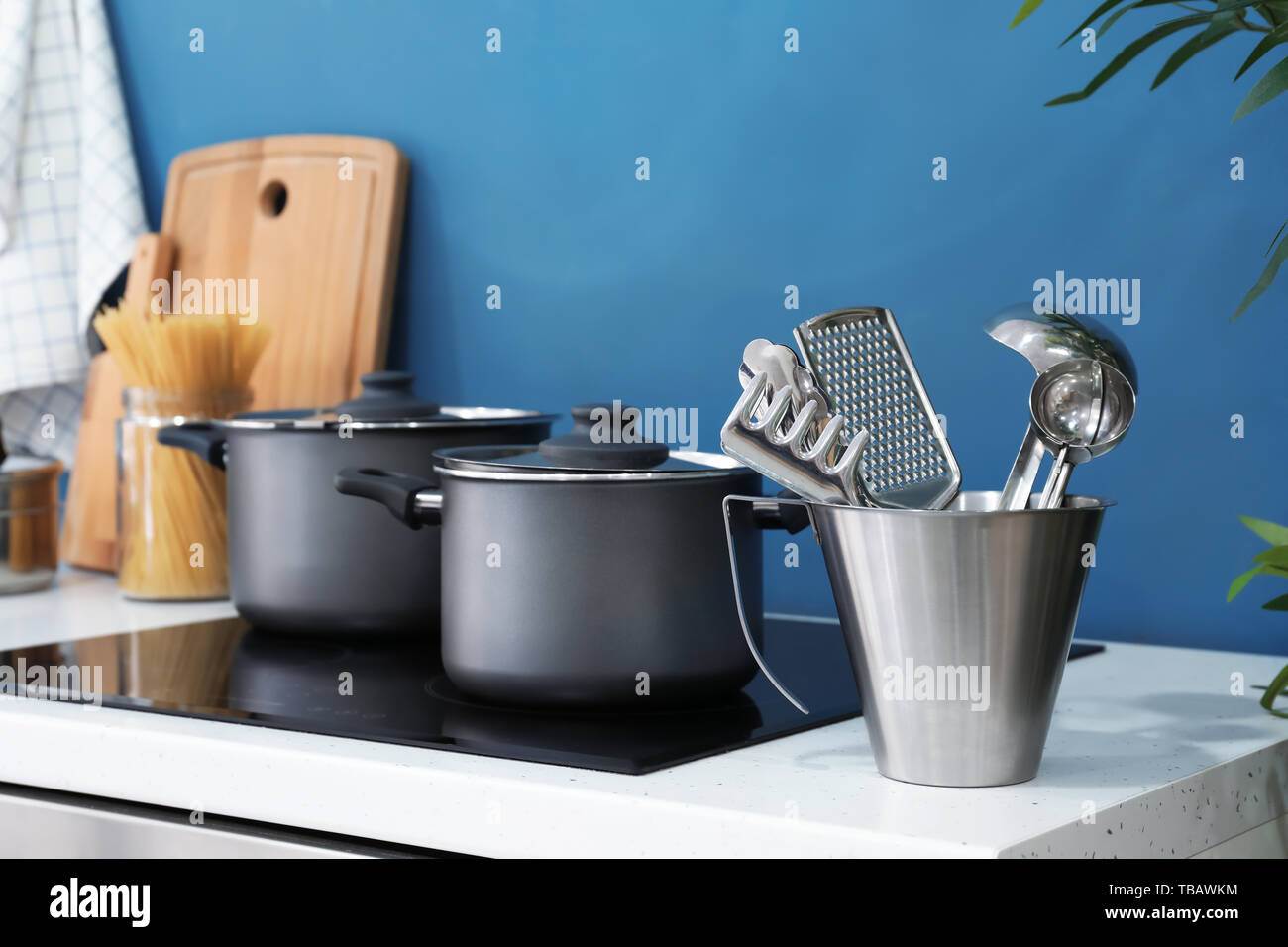 Different utensils in modern kitchen Stock Photo - Alamy