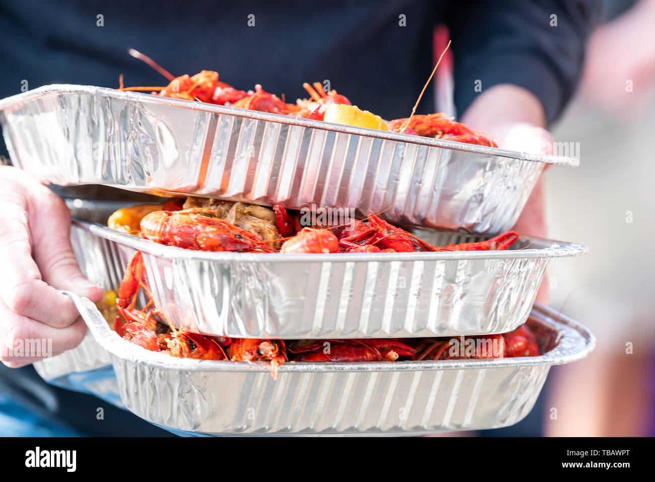 New Orleans, USA Louisiana town with people by restaurant eating ...