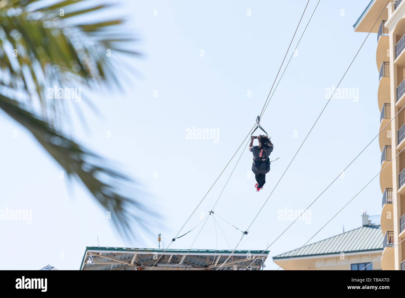 Destin, USA - April 24, 2018: One young african american woman back in ...