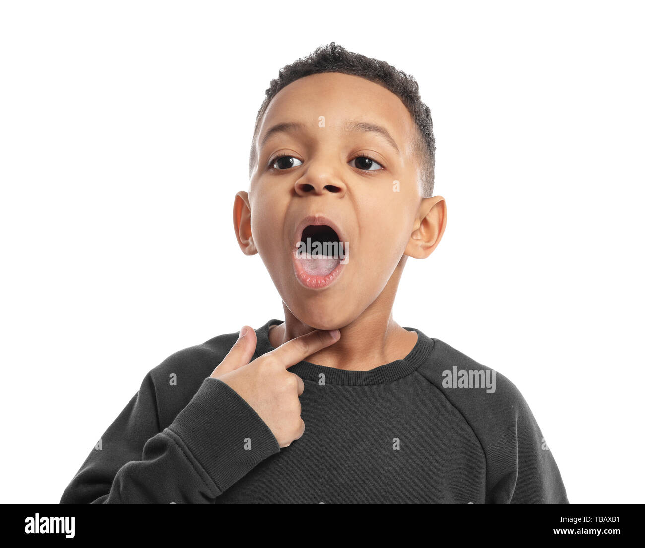 Little boy training pronounce letters on white background Stock Photo ...
