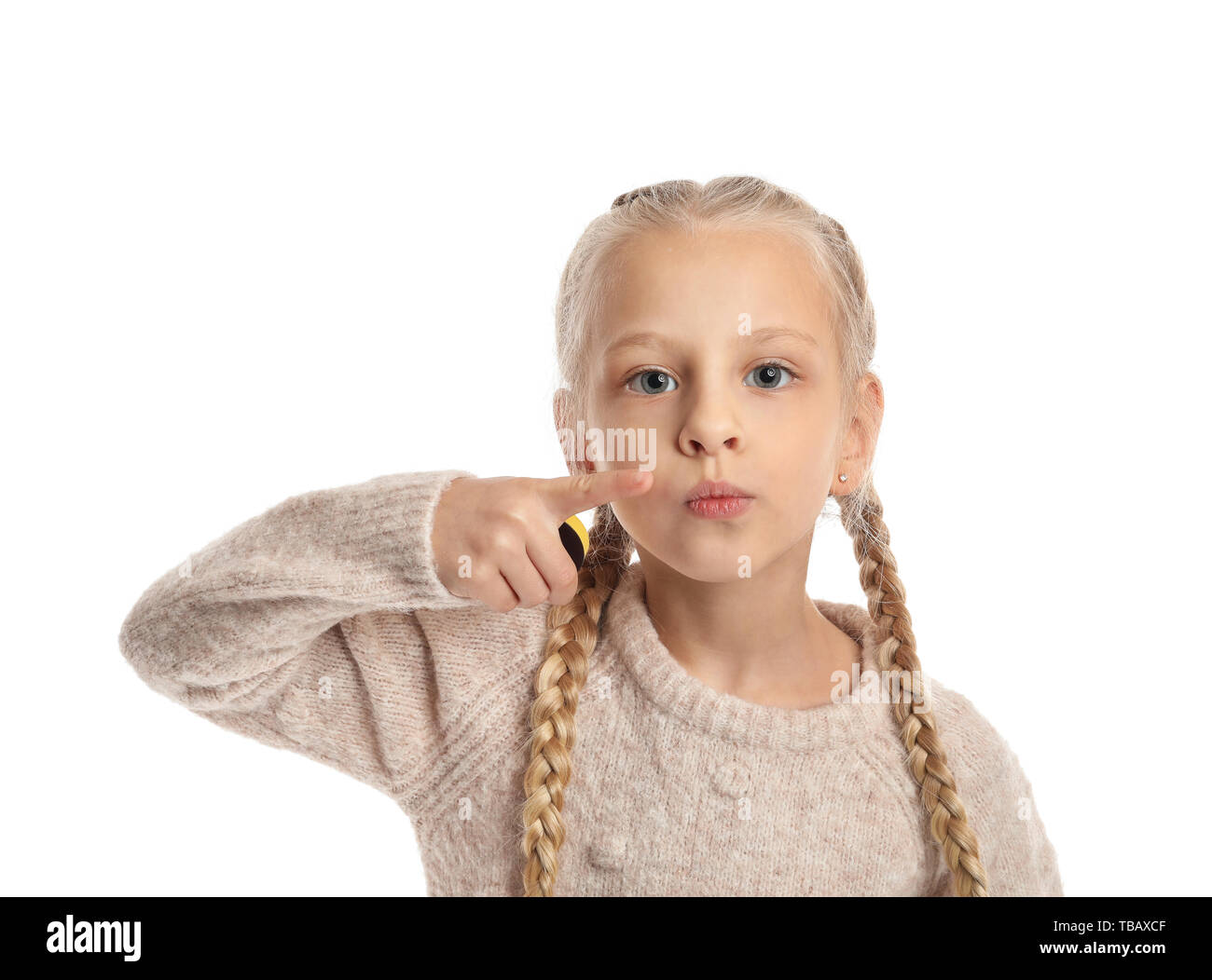Little girl training pronounce letters on white background Stock Photo ...
