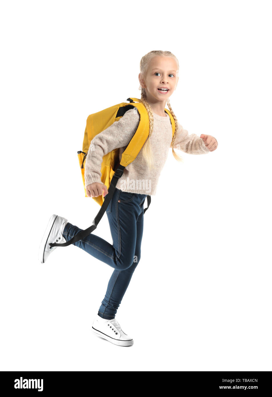 Running cute girl with backpack on white background Stock Photo - Alamy