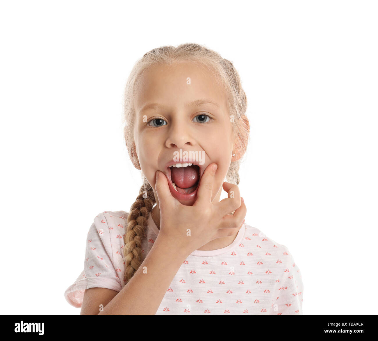 Little girl training pronounce letters on white background Stock Photo ...