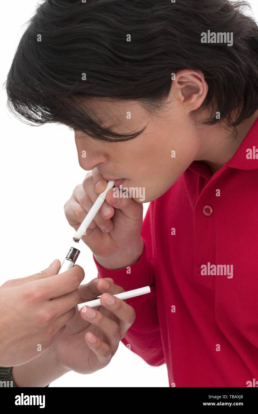 Light a cigarette Stock Photo - Alamy