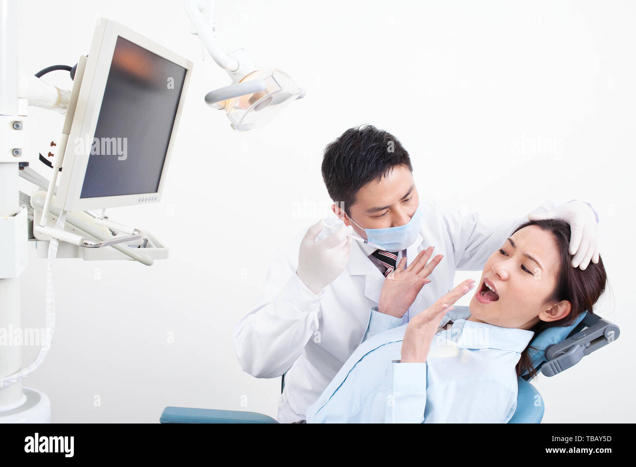 Oral examination in the clinic Stock Photo - Alamy