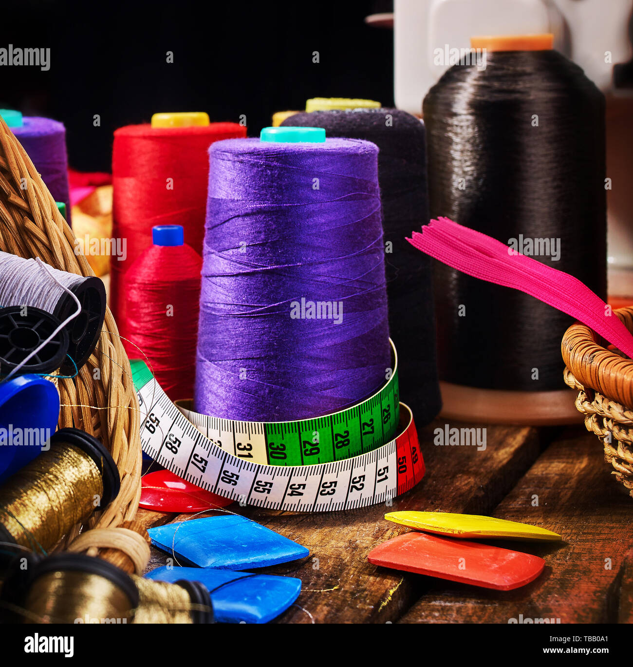 Coil threads for overlock and measuring band in sewing supplies Stock ...