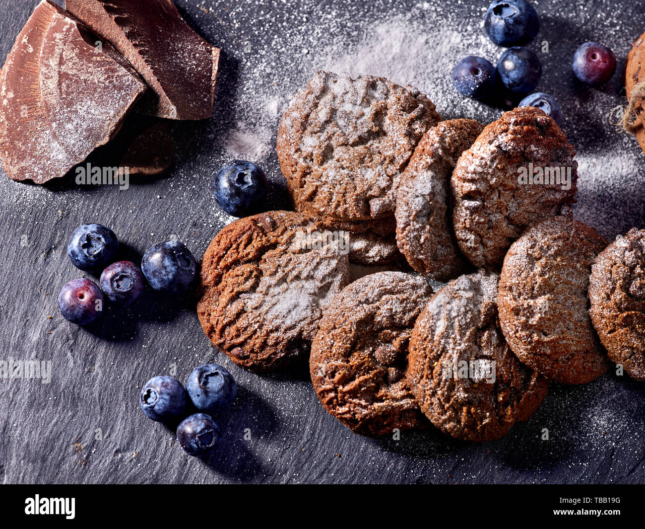 Chocolate chip cookies tied with string. Serving food on slate Stock ...