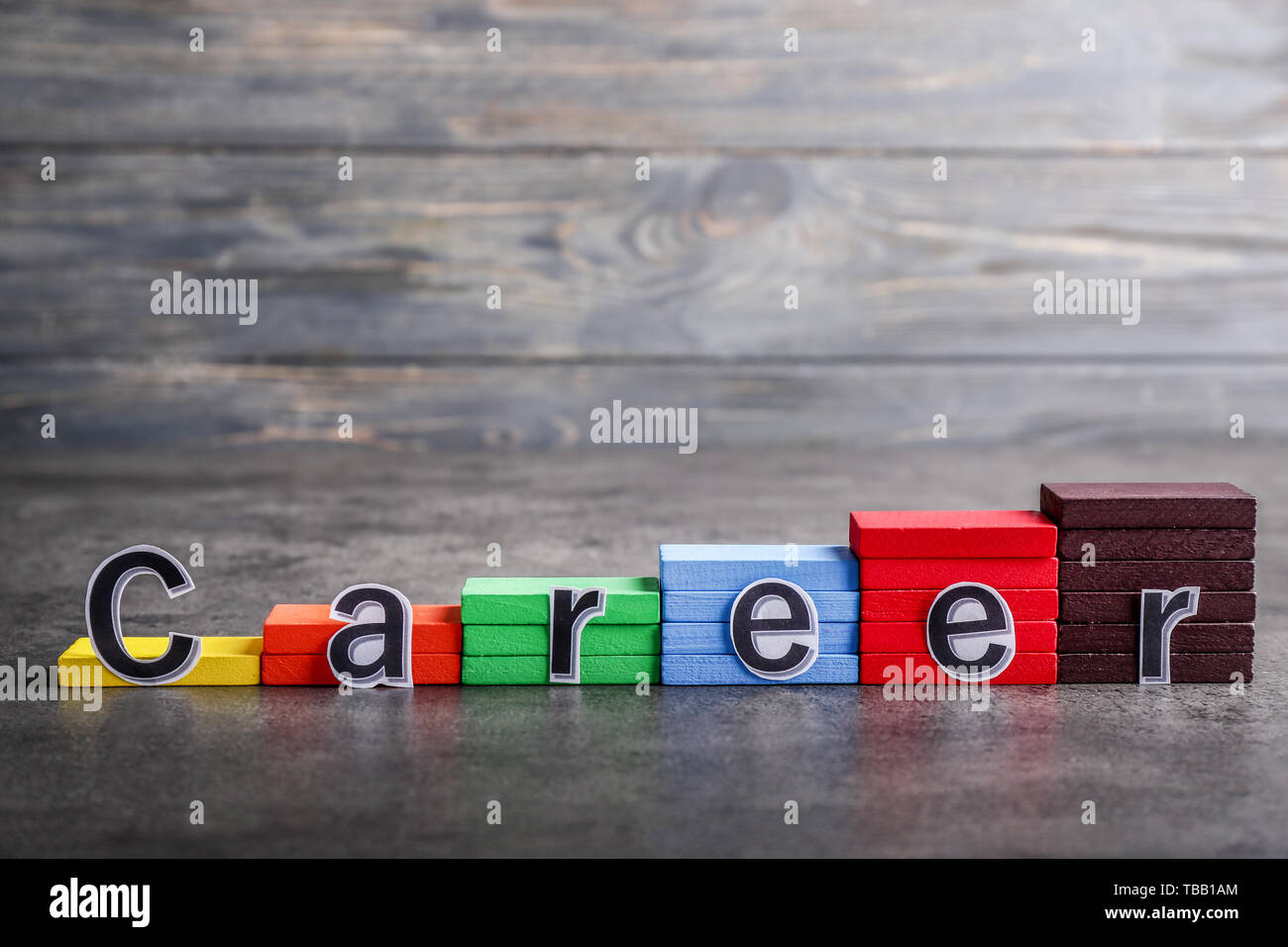 Stacked blocks with word CAREER on grey background Stock Photo - Alamy