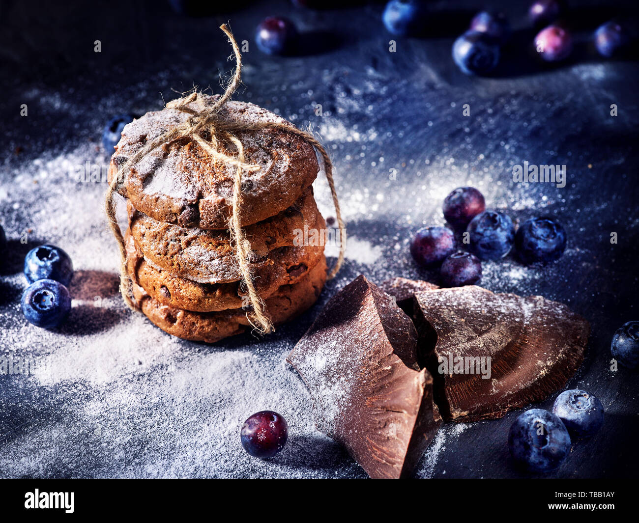 Chocolate chip cookies tied with string. Serving food on slate Stock ...