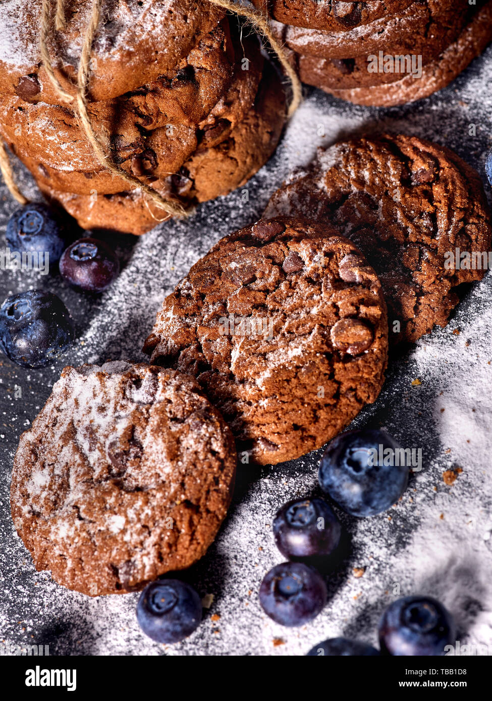 Chocolate chip cookies tied with string. Serving food on slate Stock ...