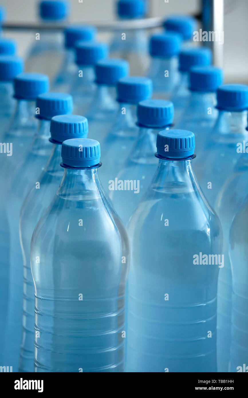 Many bottles at mineral water plant Stock Photo - Alamy