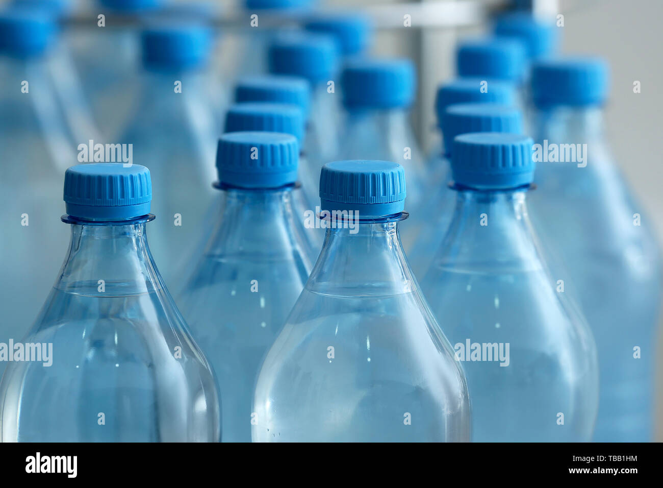 Many bottles at mineral water plant Stock Photo - Alamy