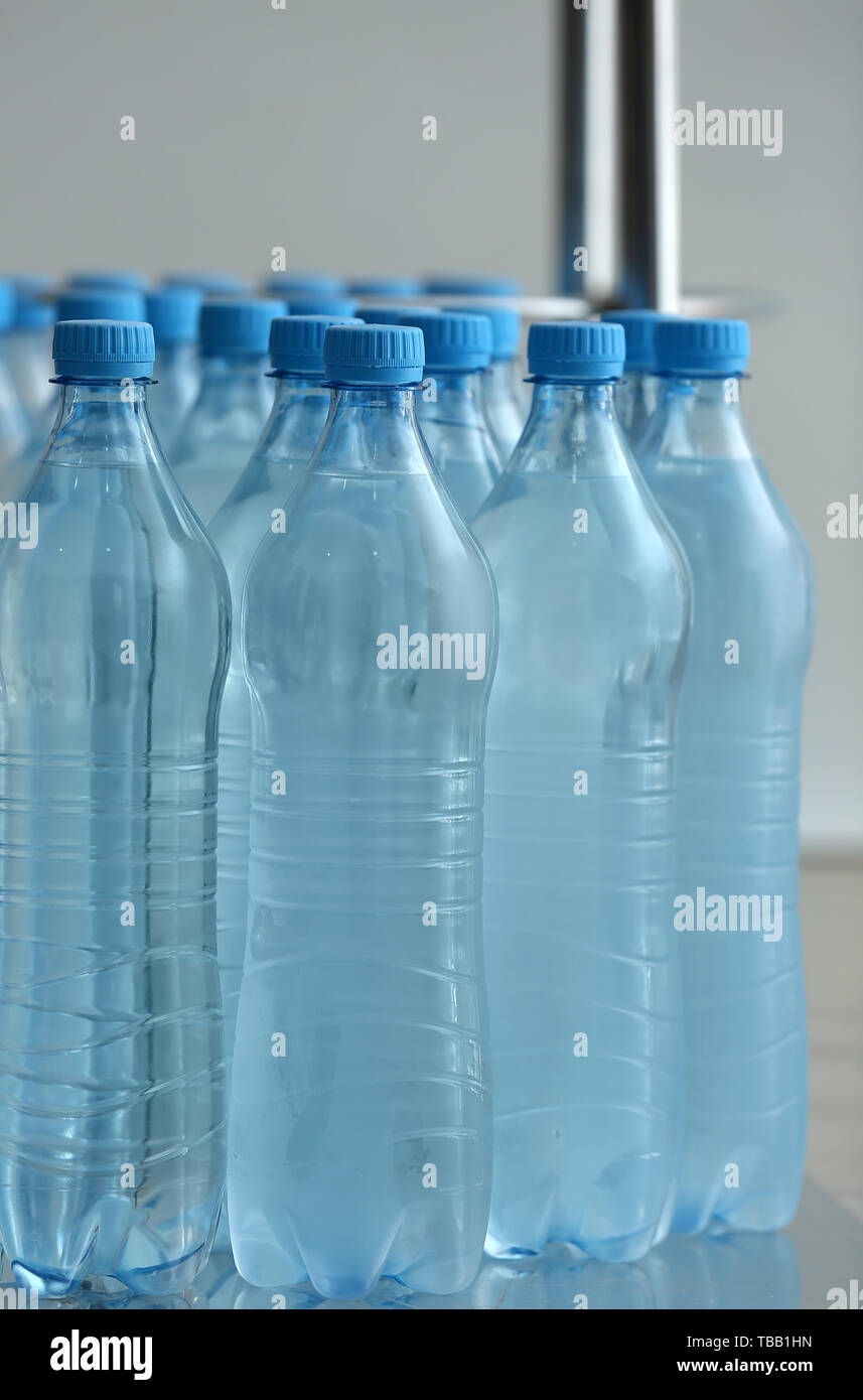 Many bottles at mineral water plant Stock Photo - Alamy