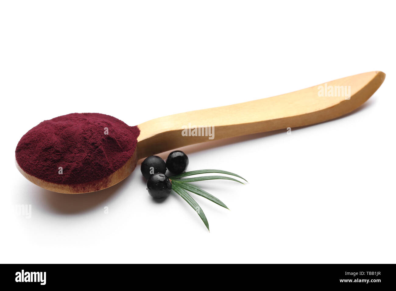 Spoon with acai powder on white background Stock Photo - Alamy