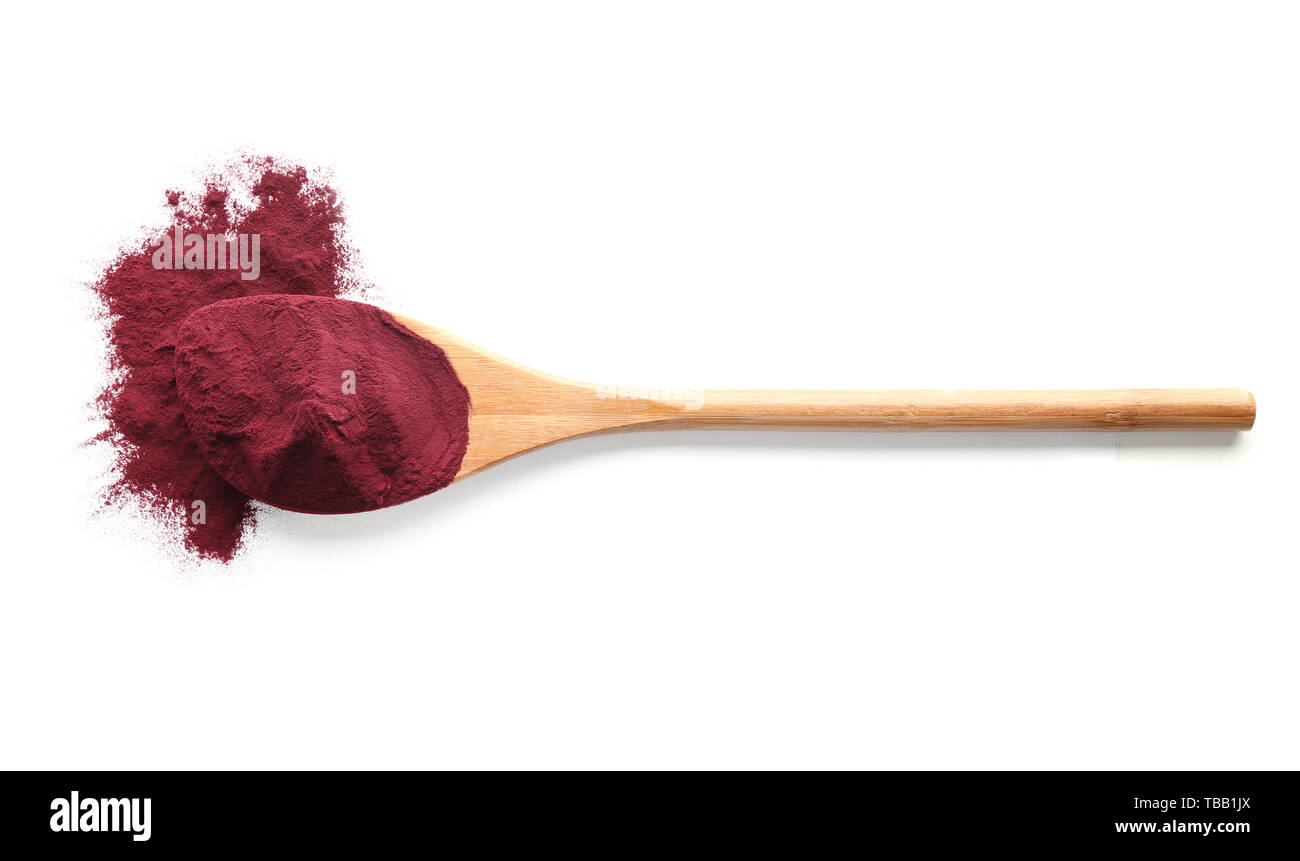 Spoon with acai powder on white background Stock Photo - Alamy