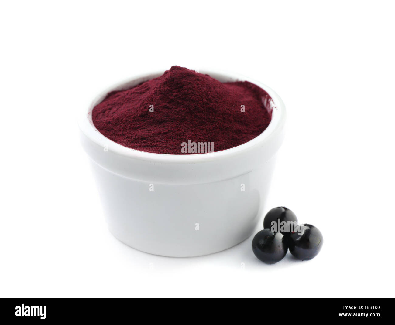 Bowl with acai powder on white background Stock Photo - Alamy