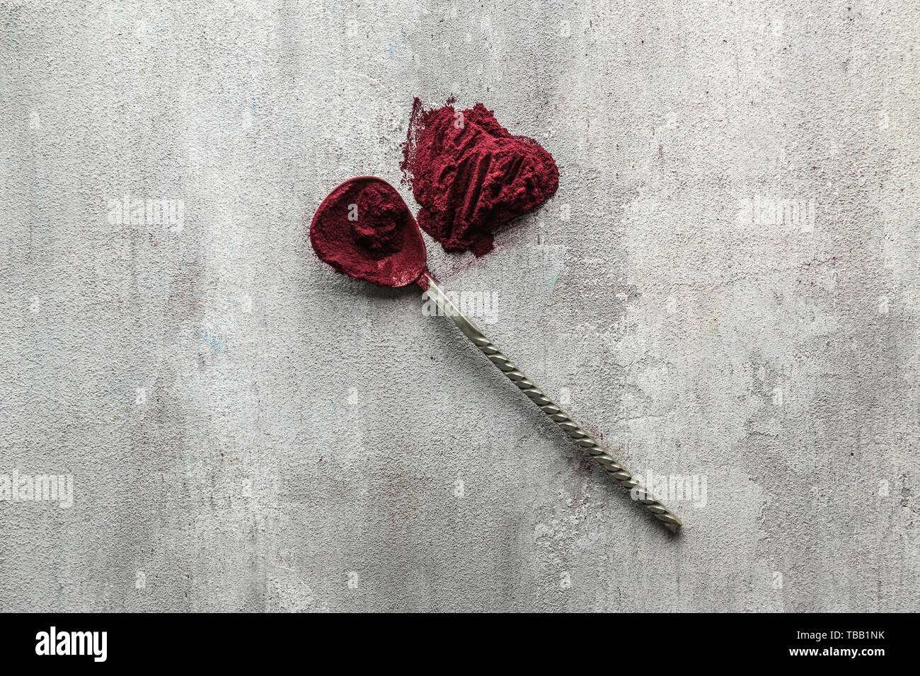 Spoon with acai powder on light background Stock Photo - Alamy
