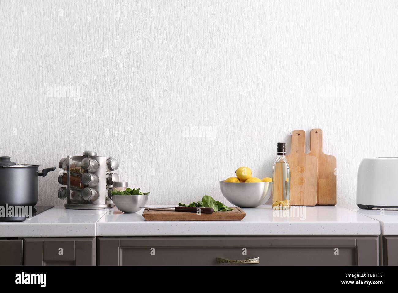 Fresh products with utensils on counter in kitchen Stock Photo - Alamy