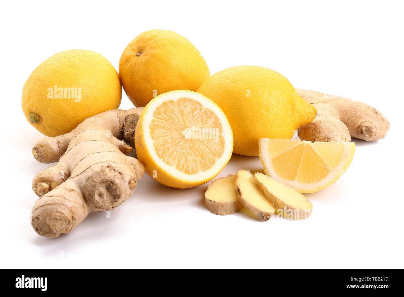 Fresh lemon with ginger on white background Stock Photo - Alamy