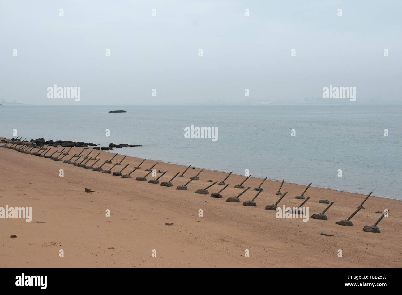 Protective bollards guarding the beach from enemy boat landings in the ...