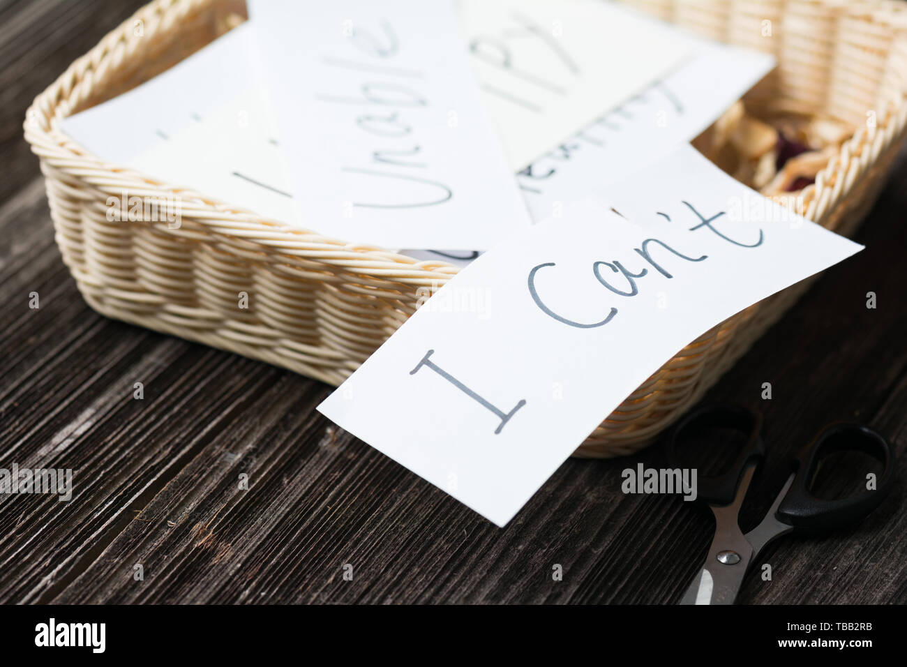 Reynolds card with text on old wood plate Stock Photo - Alamy