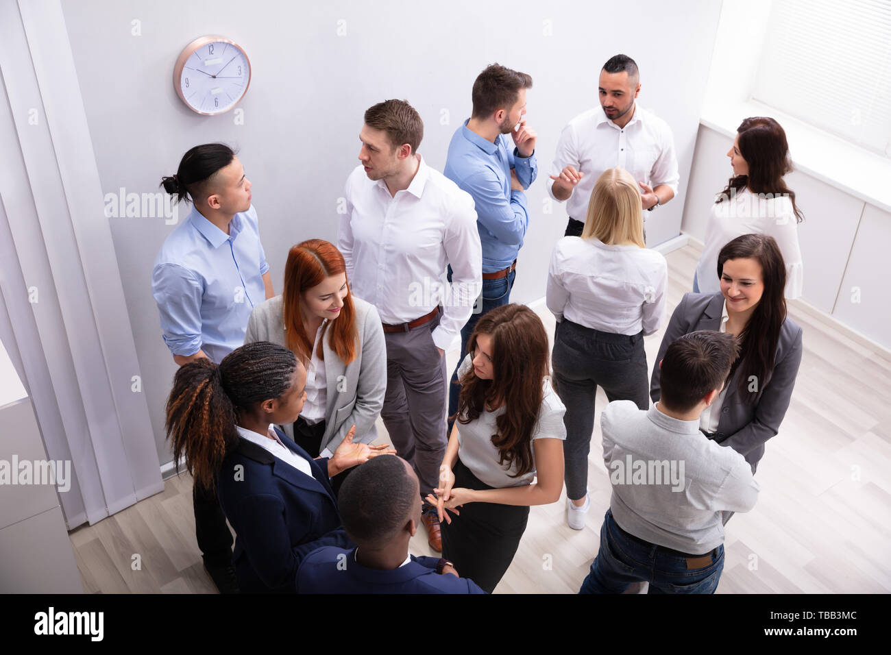 Office smile clock hi-res stock photography and images - Alamy