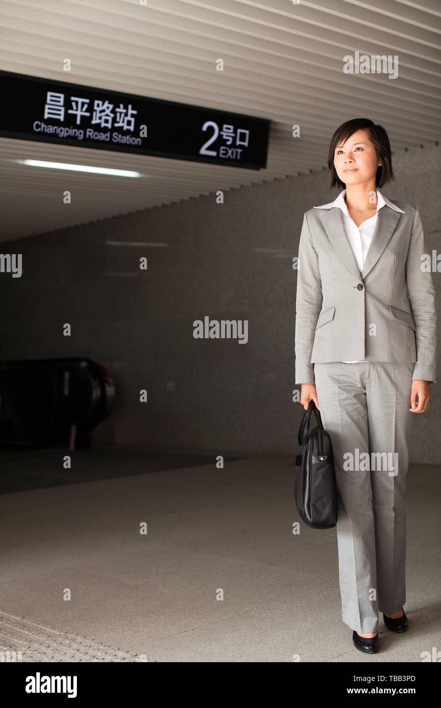 Business people take the subway on their commute to and from work Stock ...