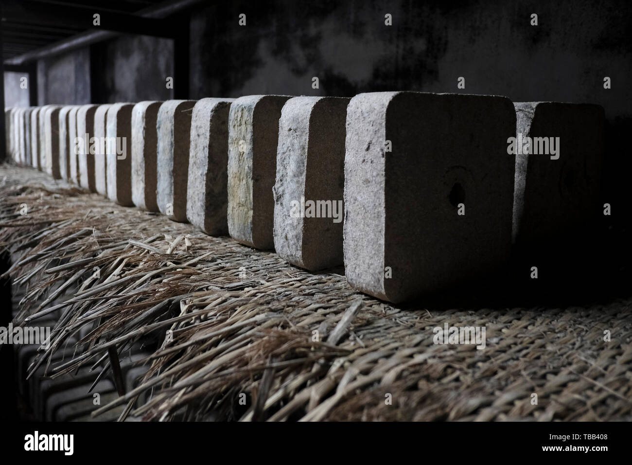 Wheat bricks fermenting in a dark cultivating yeast room in Kinmen ...