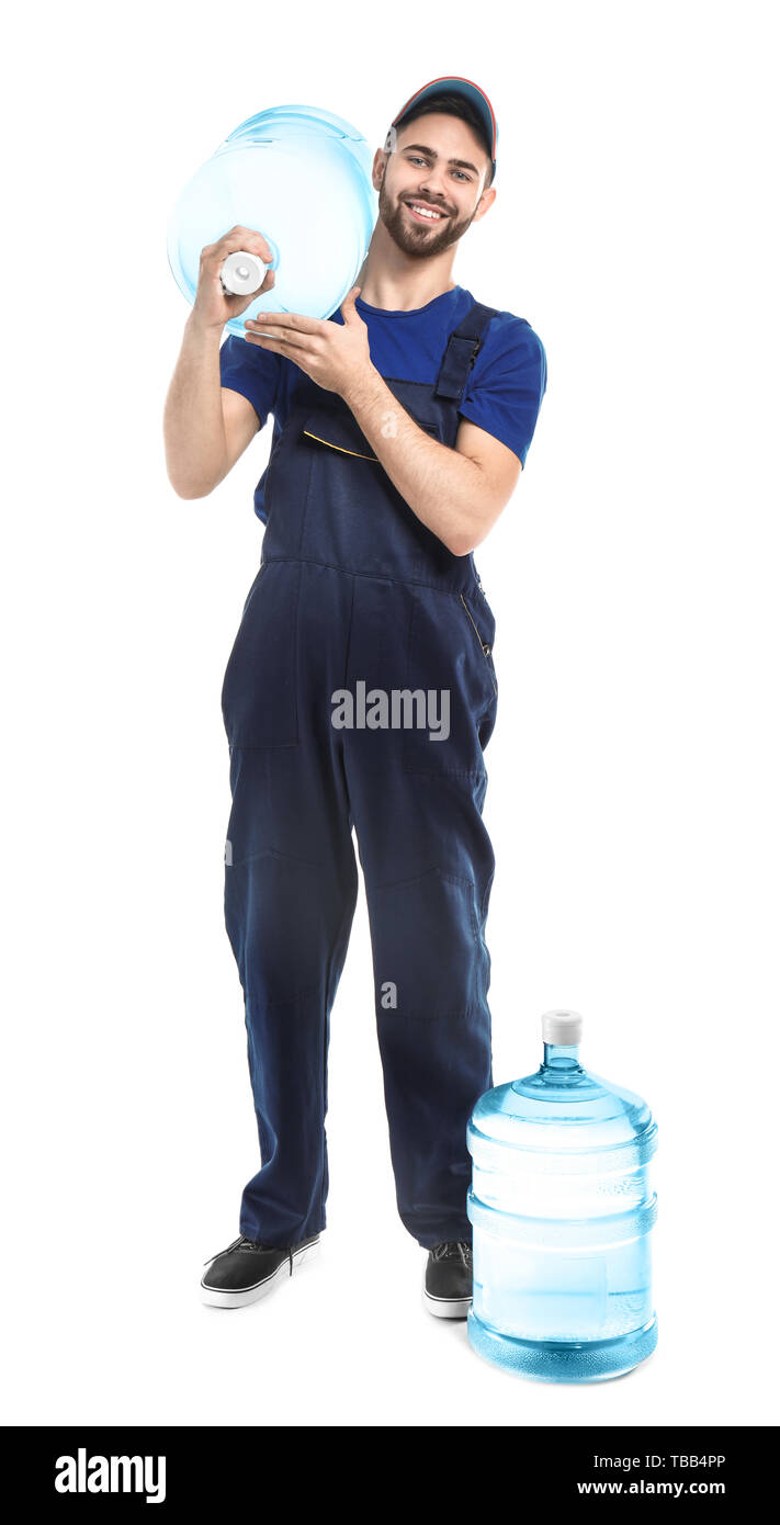 Delivery man with bottles of water on white background Stock Photo - Alamy