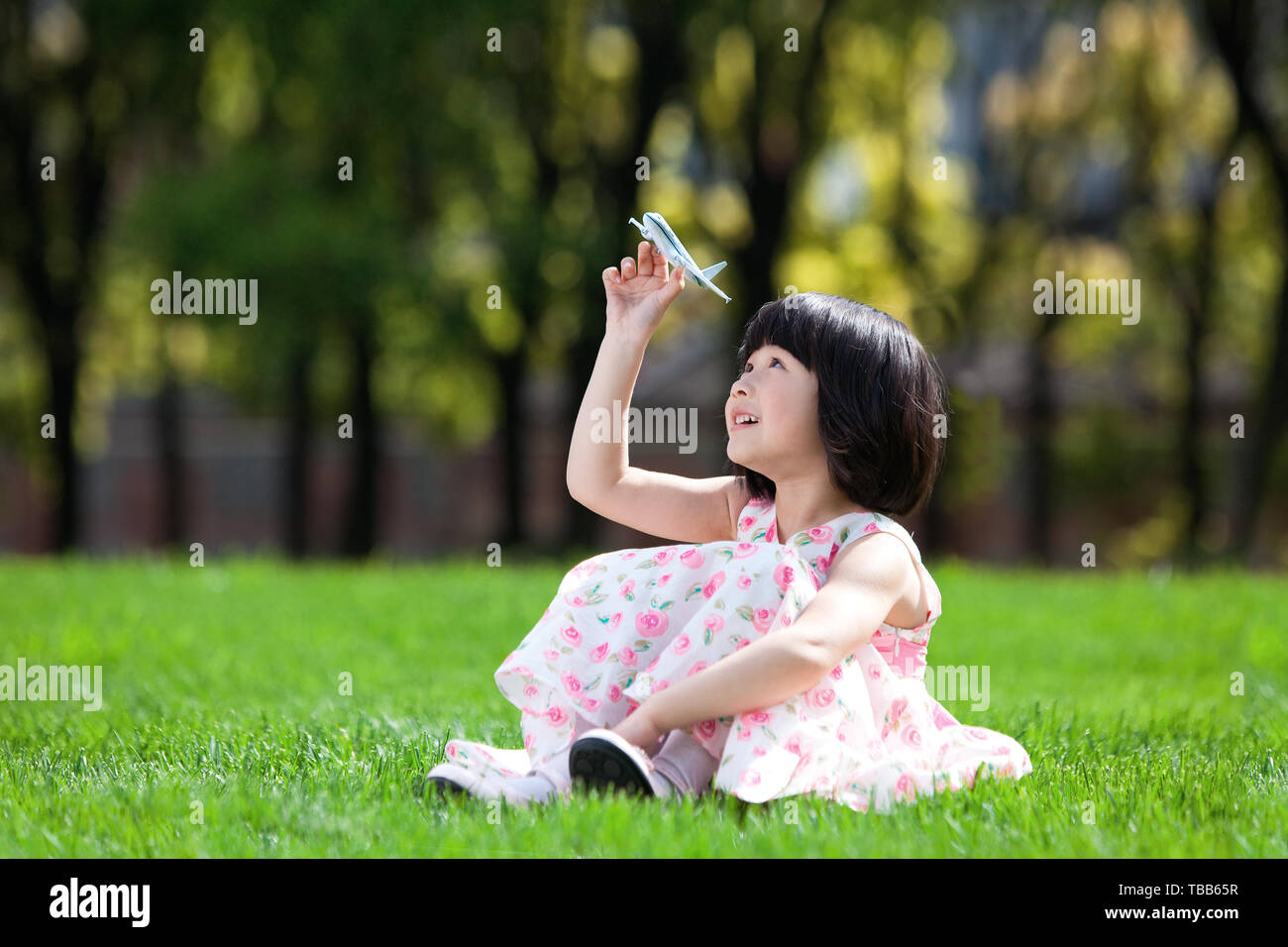 a girl playing outdoors Stock Photo - Alamy