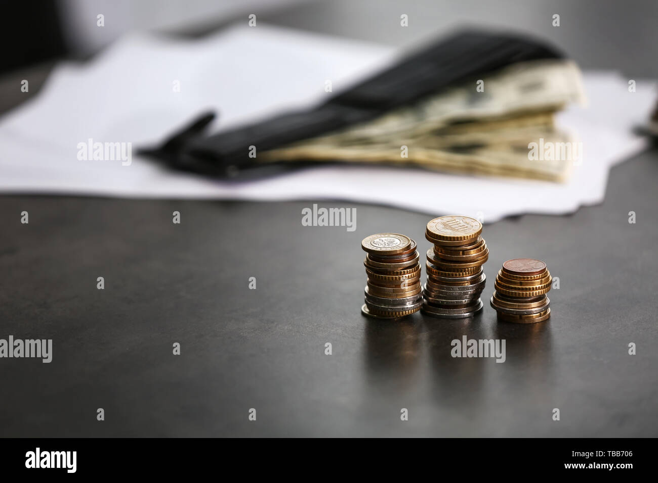 Stacked coins on table. Concept of planning budget Stock Photo - Alamy