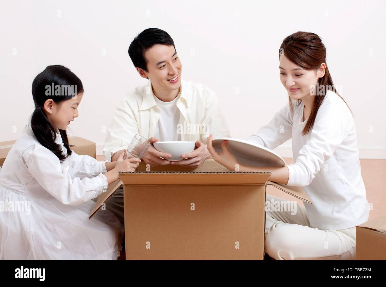 family of three Stock Photo - Alamy