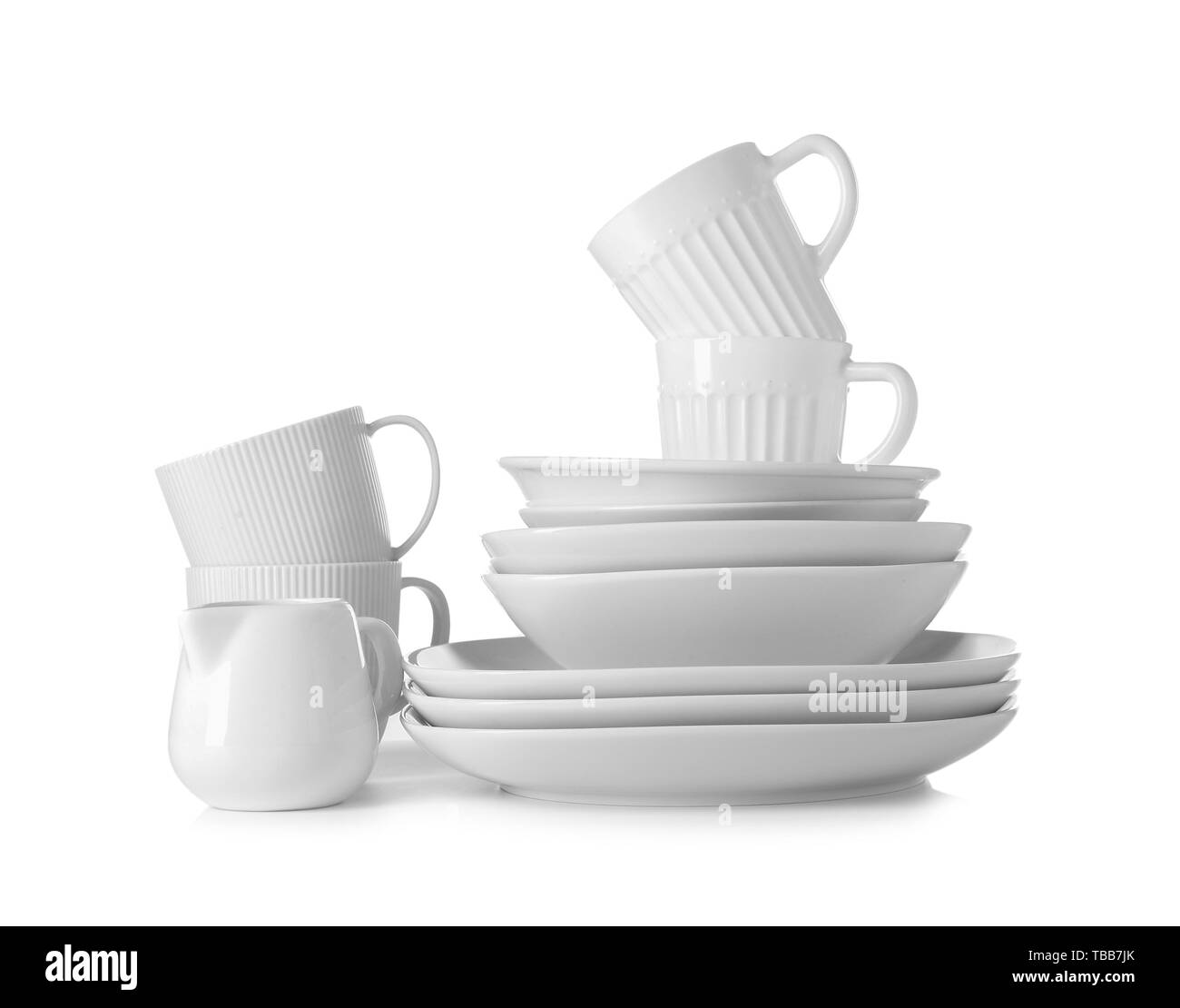 Set of clean dishes on white background Stock Photo - Alamy