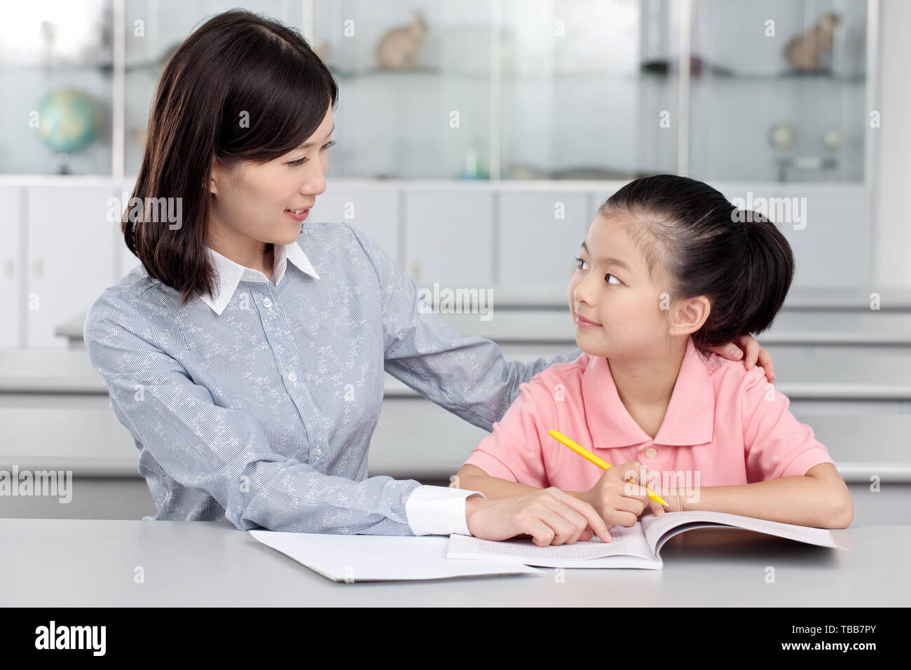 Interaction between teachers and students Stock Photo - Alamy