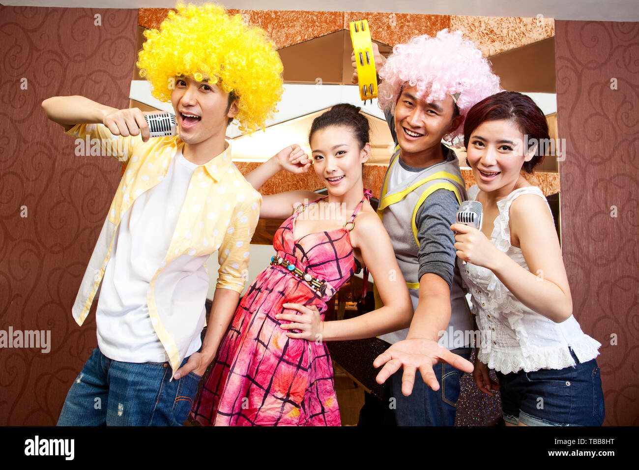 Four friends, party, party Stock Photo - Alamy