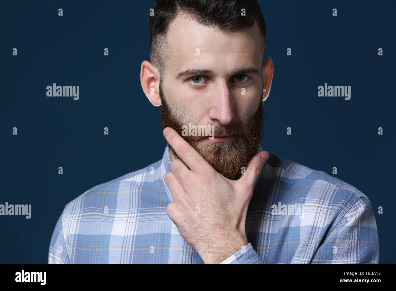 Bearded man on color background Stock Photo - Alamy