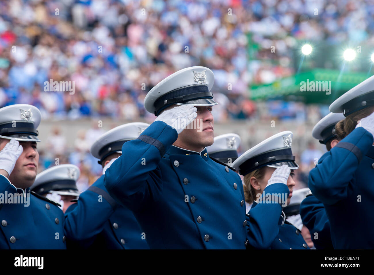 Cadets salute for the national anthem played during the U.S. Air Force ...