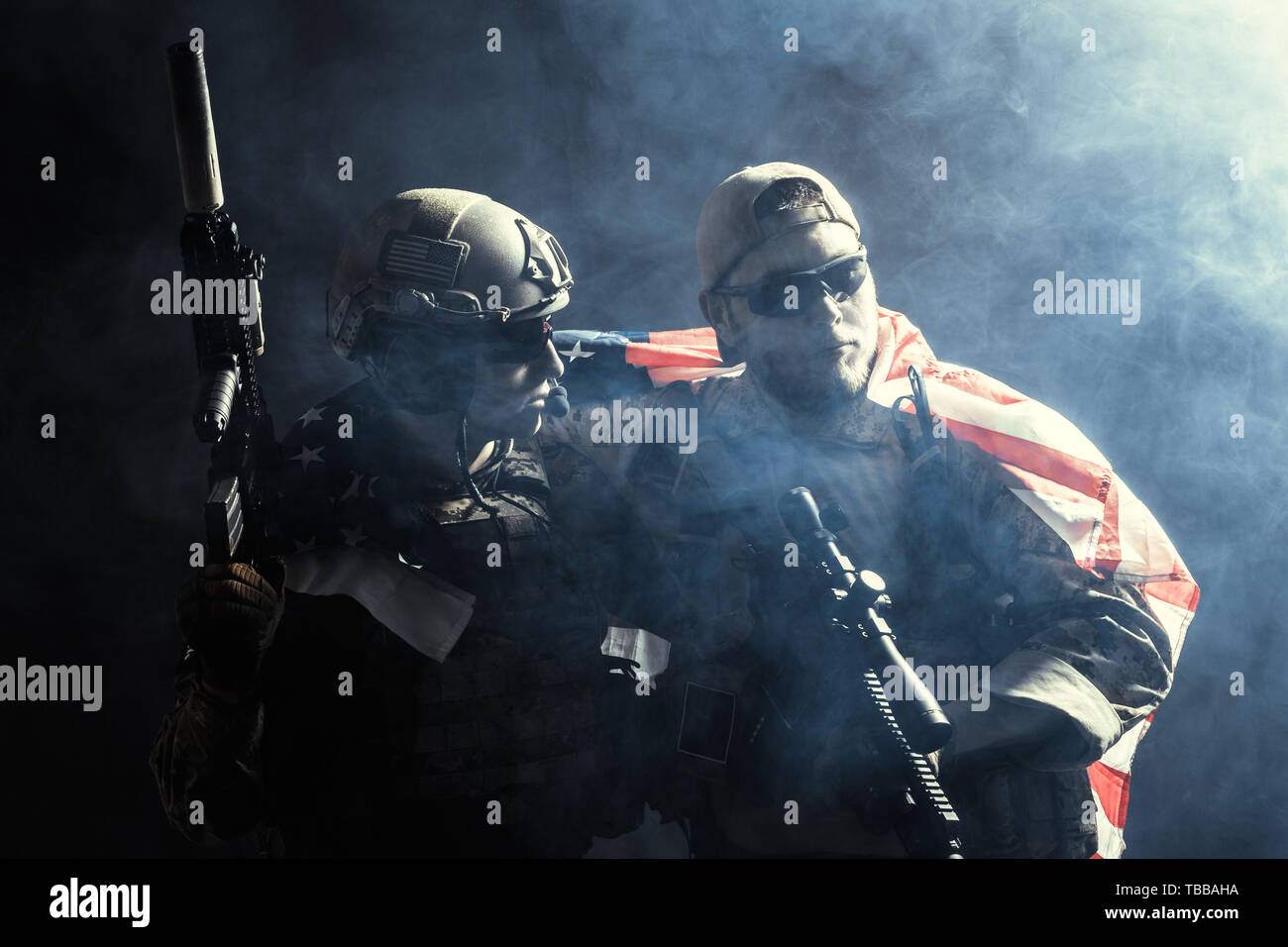 Soldier holding machine gun with national flag Stock Photo - Alamy