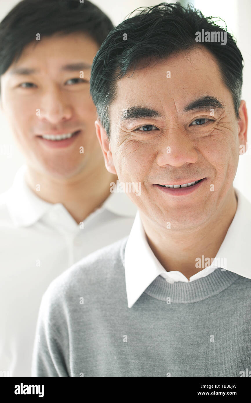 A portrait of a father and son Stock Photo - Alamy