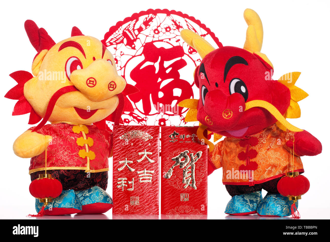Some festive Year of the Dragon mascots Stock Photo - Alamy