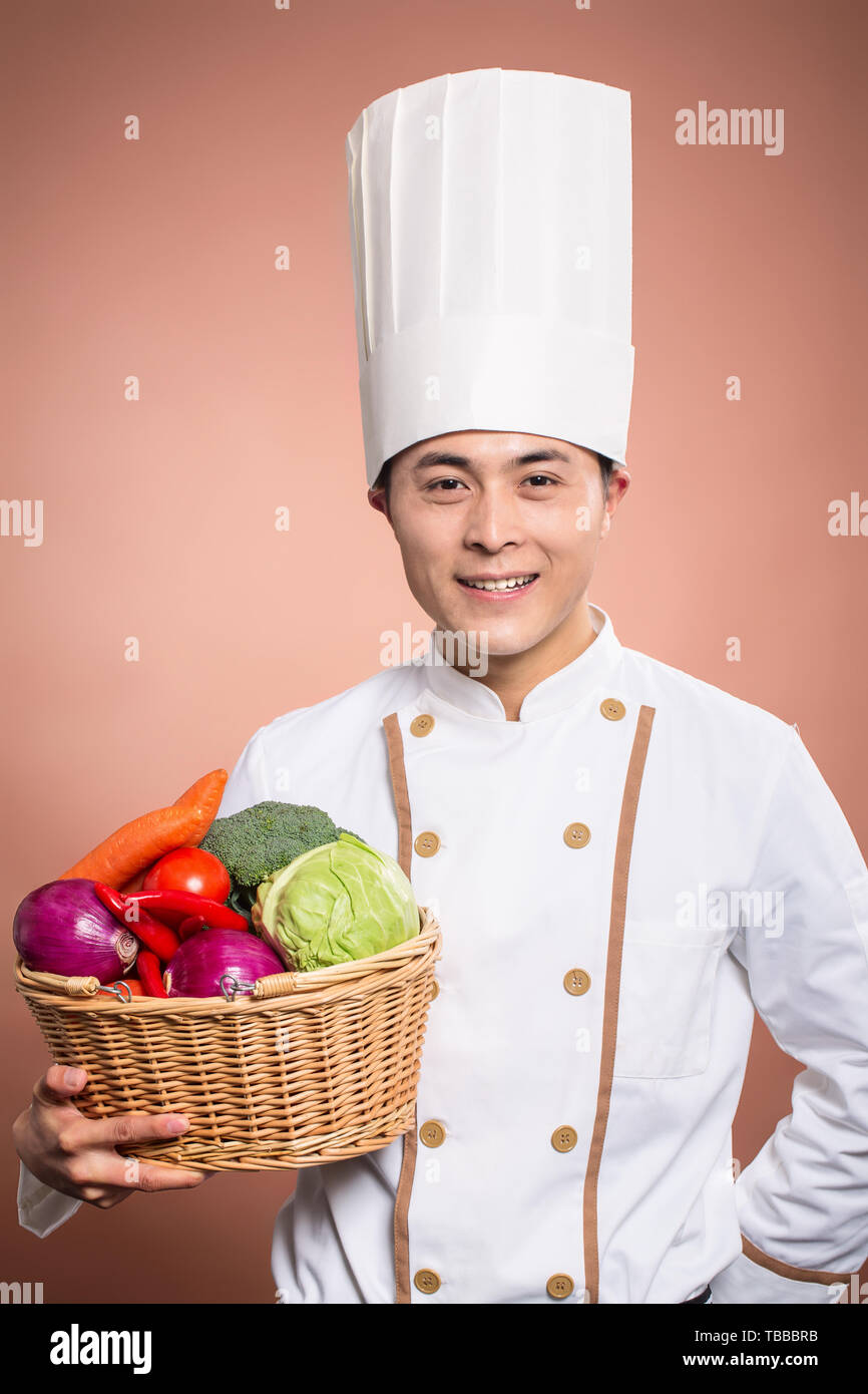 Chef cooking delicious dishes Stock Photo - Alamy