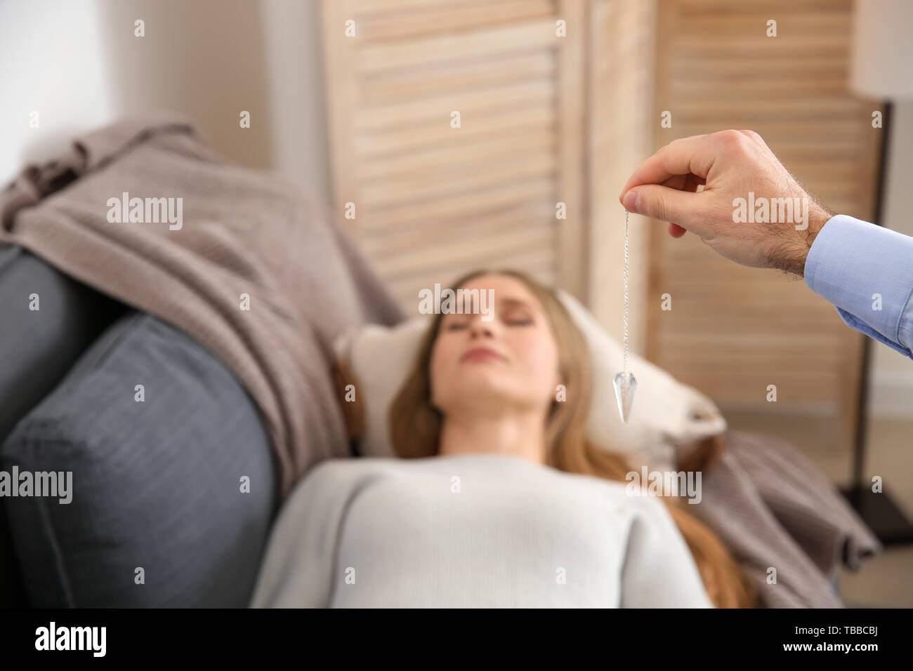 Hypnotizing woman hi-res stock photography and images - Alamy