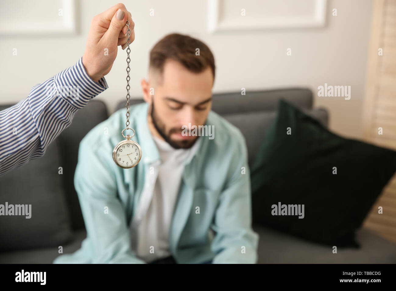 Hypnotizing hand hi-res stock photography and images - Alamy