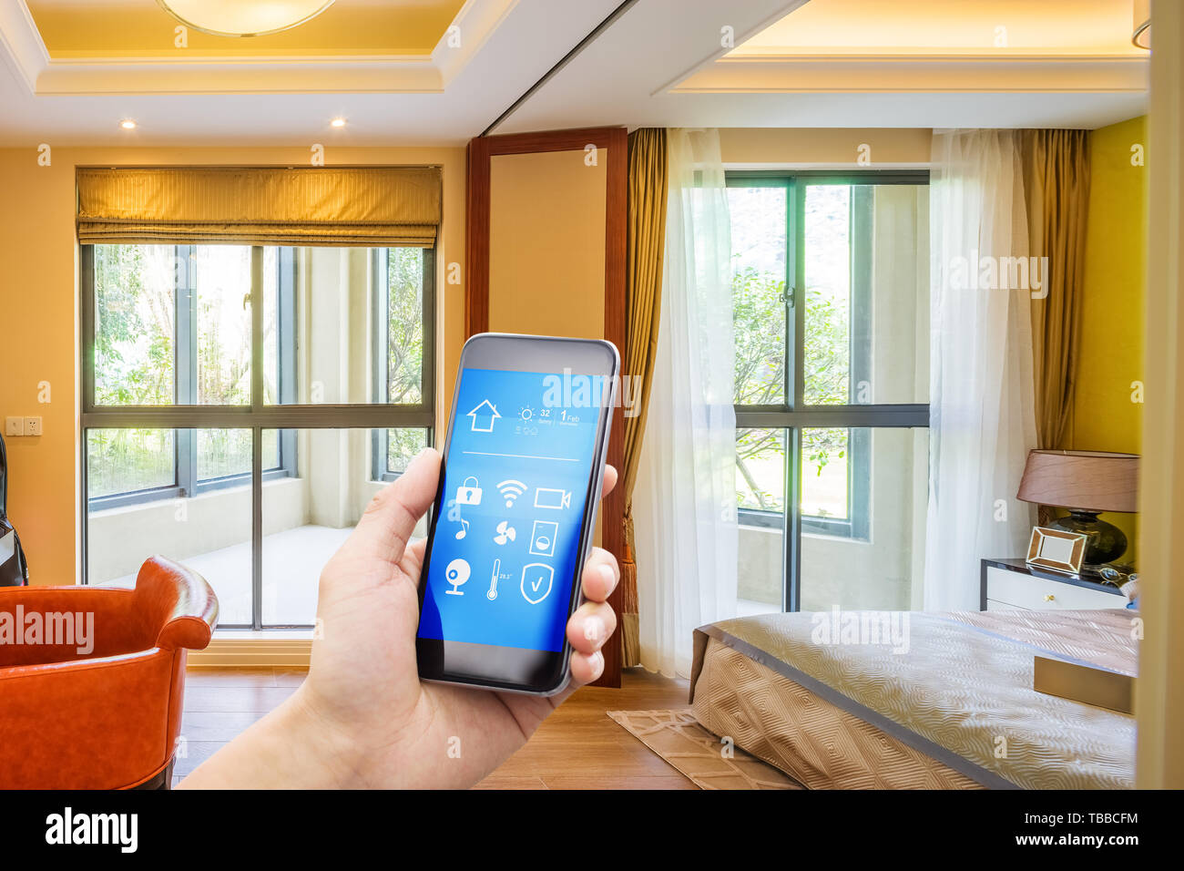 smart phone with smart home with modern bedroom Stock Photo - Alamy