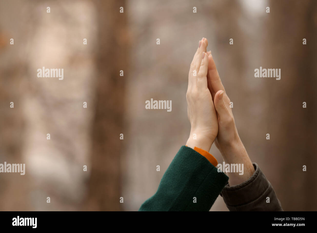 Two palms touch hi-res stock photography and images - Alamy