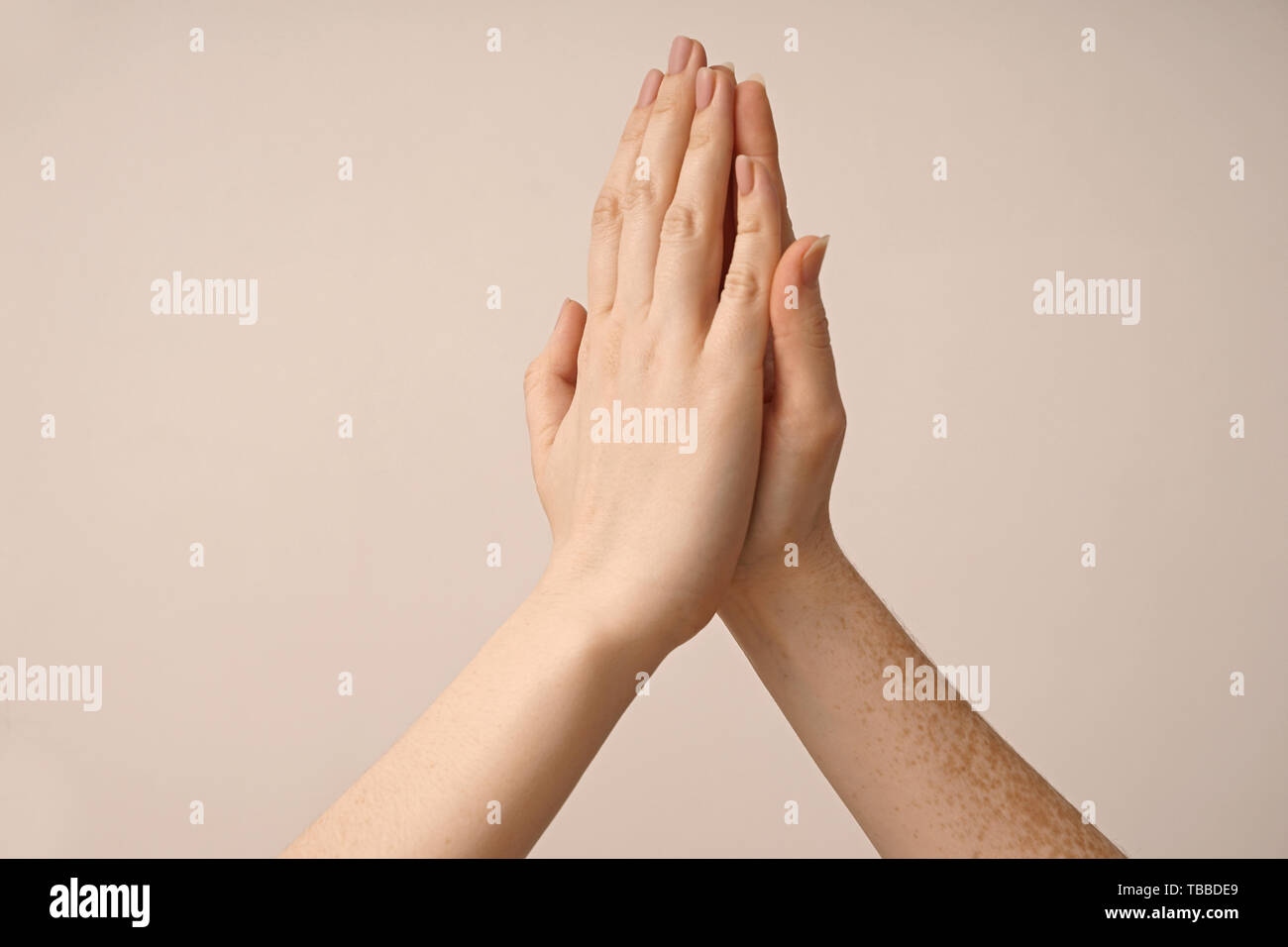 Two palms touch hi-res stock photography and images - Alamy