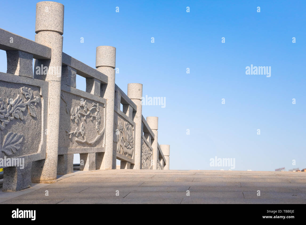 In the morning, the stone bridge railing in the sun Stock Photo - Alamy